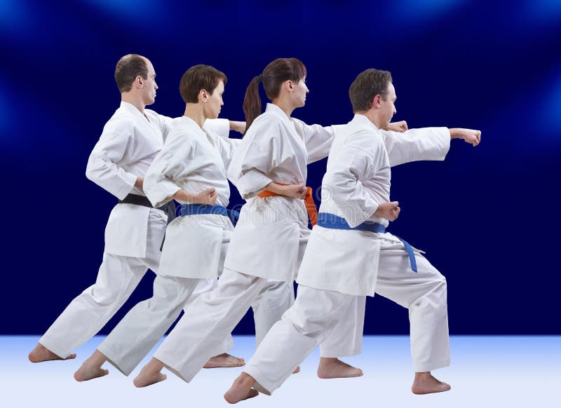 On a Dark Blue Background the Athletes are Beating Punch Arm Stock ...