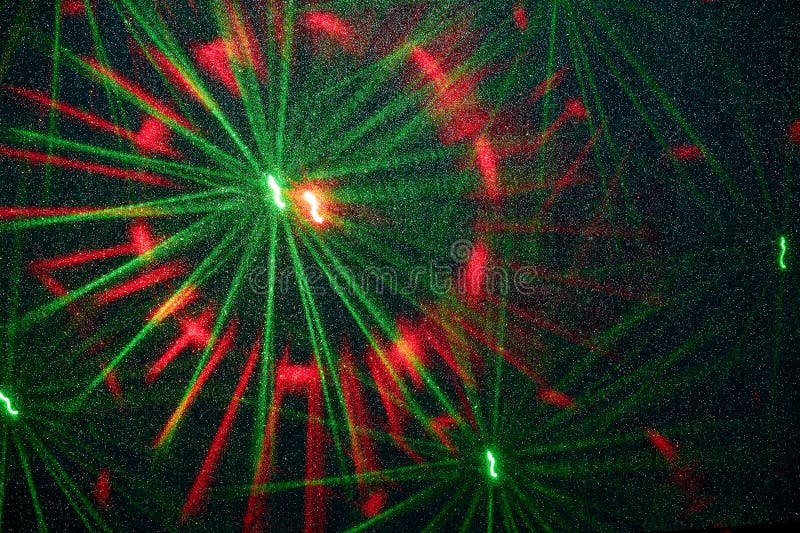 On a Dark Blue Background in Fine Grain, a Pattern of Green and Red ...