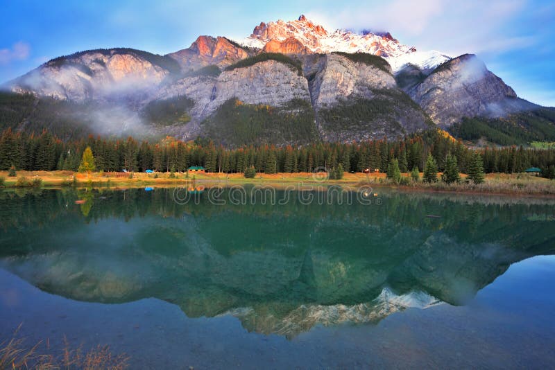 The Cold Lake, Forest and Snow Mountains in Canada Stock Image - Image ...