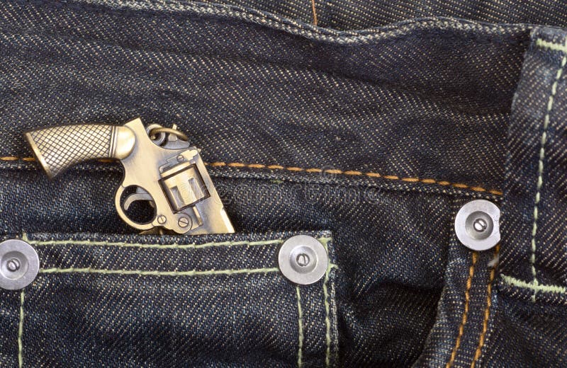 Dark Blue Denim Jeans with a Gun Stock Photo - Image of closeup ...
