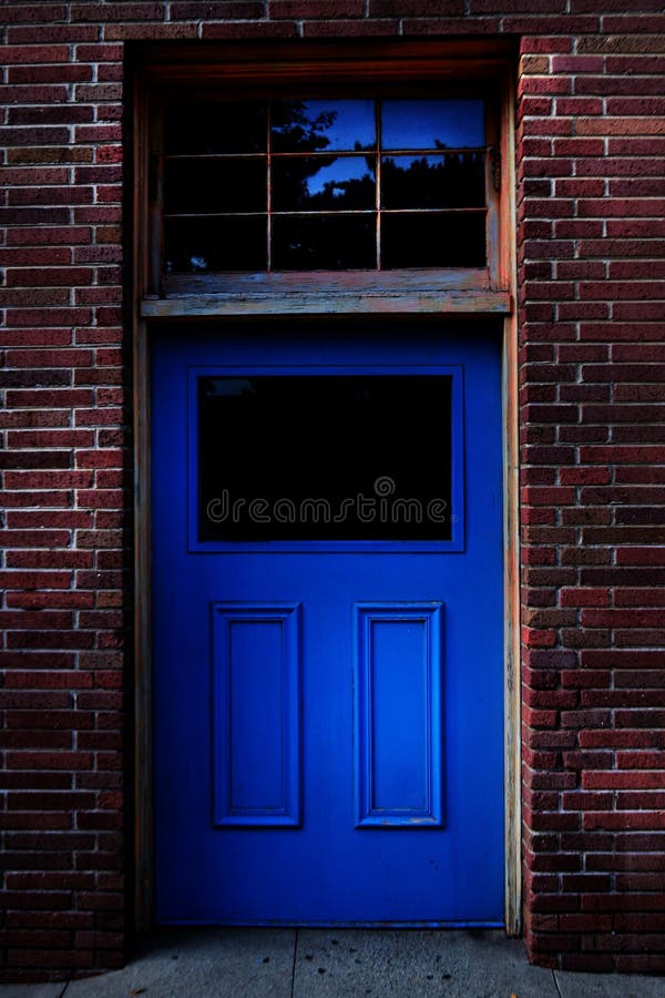 Dark Blue Door in a Brick Wall Stock Photo - Image of brick, retro ...