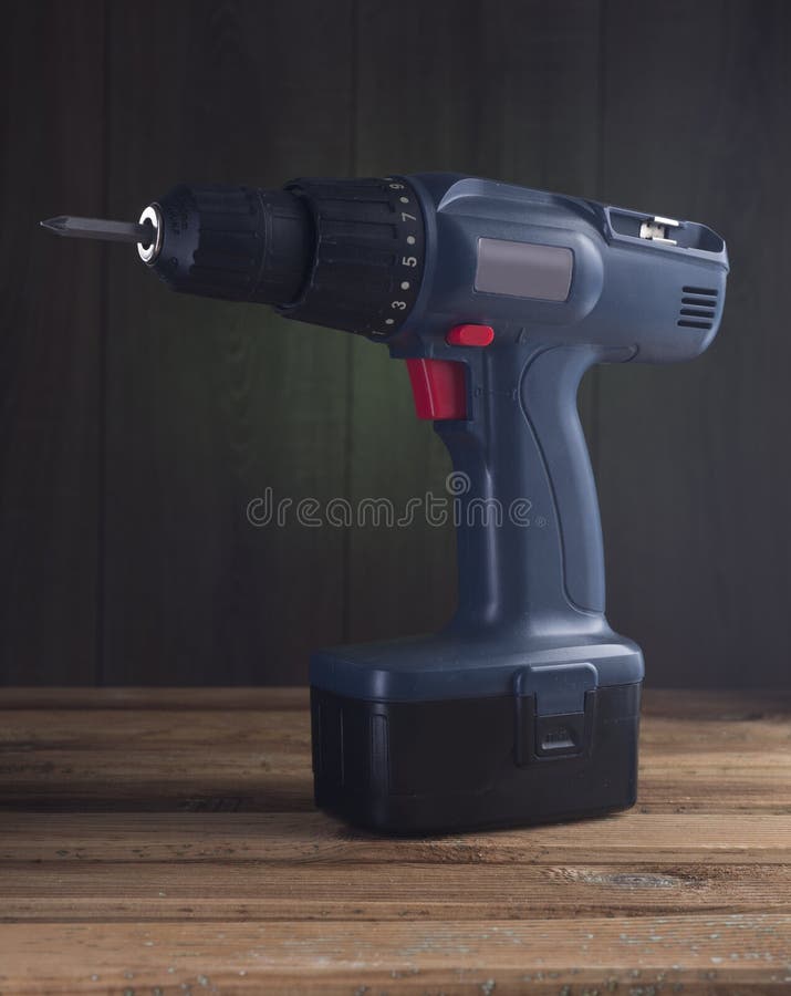 Dark blue drill. stock image. Image of carpentry, house - 82163023