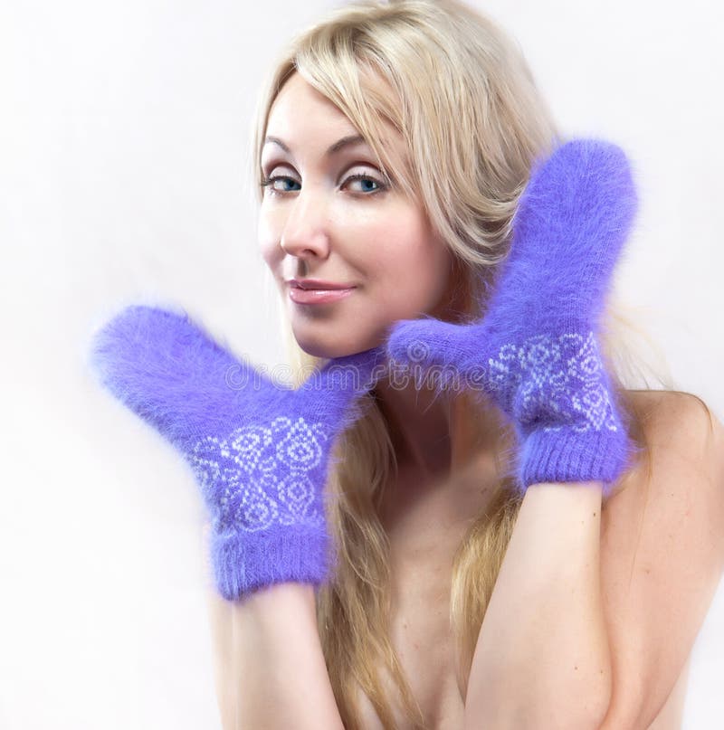 Dark Blue Fluffy Mittens on Hands of the Blonde Stock Image - Image of ...