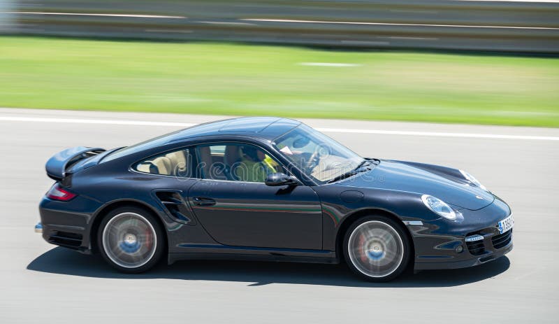 Dark Blue Porsche 911 996 Racing on the Racing Circuit Editorial Stock ...