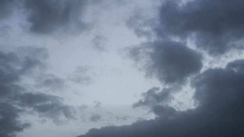 Dark Blue Rain Clouds in the Dark Blue Sky at Blue Hour. Stock Image ...