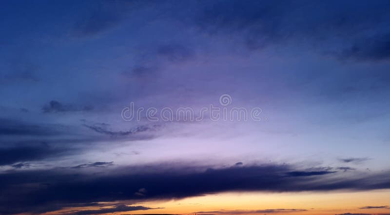 Dark Blue Sky with Bright Orange Sunset Stock Photo - Image of rosy ...