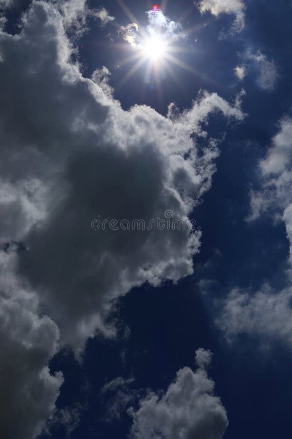 Dark Blue Sky with Clouds and Sun Stock Image - Image of cloud, light ...