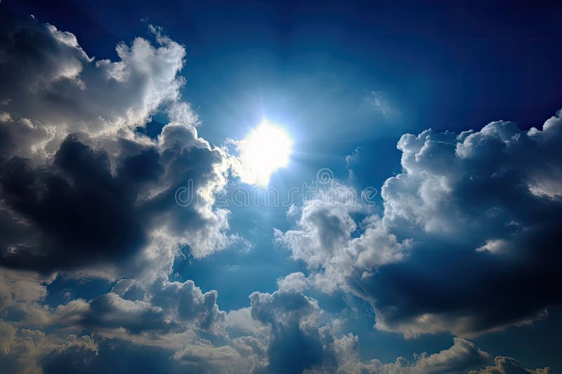 Dark Blue Sky with Fluffy Clouds and Glimpse of the Sun Stock ...