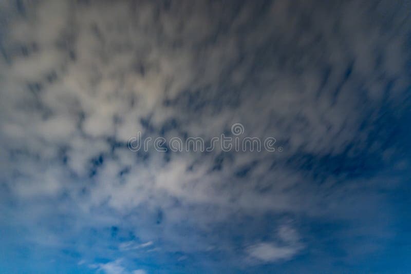 Dark Blue Sky on Long Exposure with Moving Clouds at Night Stock Photo ...