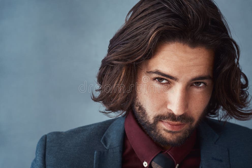 Dark and Brooding Good Looks. Studio Shot of a Handsome and Dapper ...