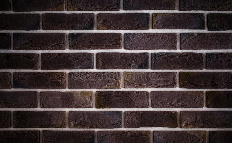 Dark brown brick wall stock photo. Image of brickwork - 82299844