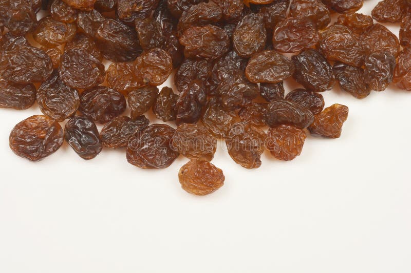 Dark brown raisins stock image. Image of detail, scattering - 366882899