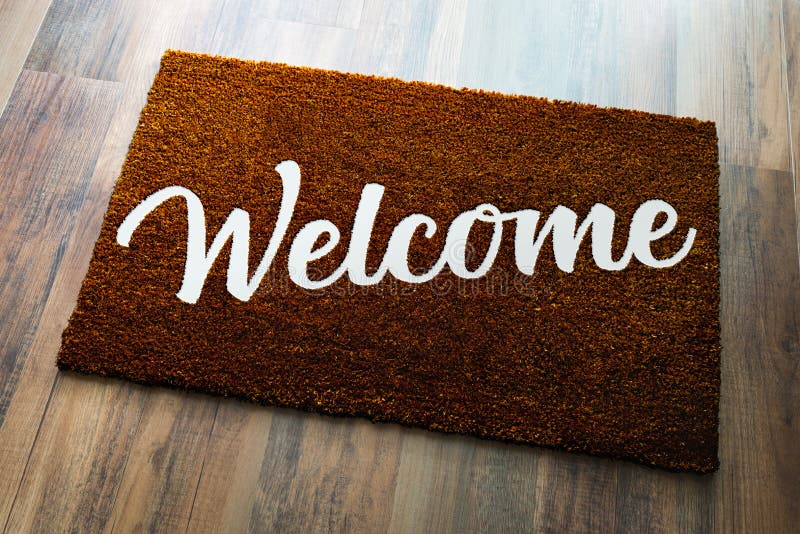 Dark Brown Welcome Mat on Wood Floor Background Stock Image - Image of ...