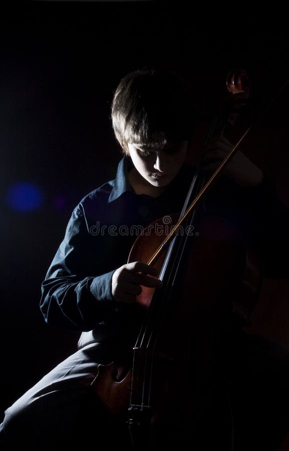 Dark cello stock image. Image of musician, beautiful, face - 8941285