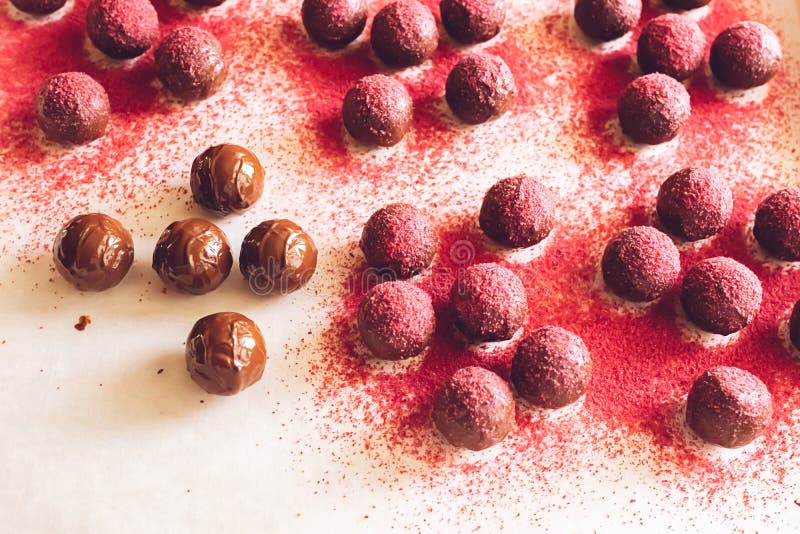 Dark Chocolate Candy with Red Powder. Production of Homemade Chocolate ...