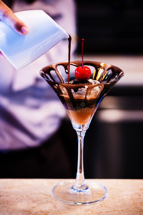 Dark Chocolate Ice Cream with Cherry on Top Stock Photo - Image of ...