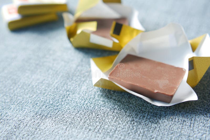 Dark Chocolate in a Paper Packet on Table Stock Photo - Image of snack ...