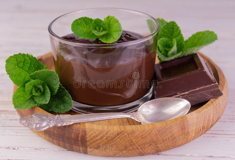 Dark Chocolate Pudding with Mint.Close-up. Stock Photo - Image of ...
