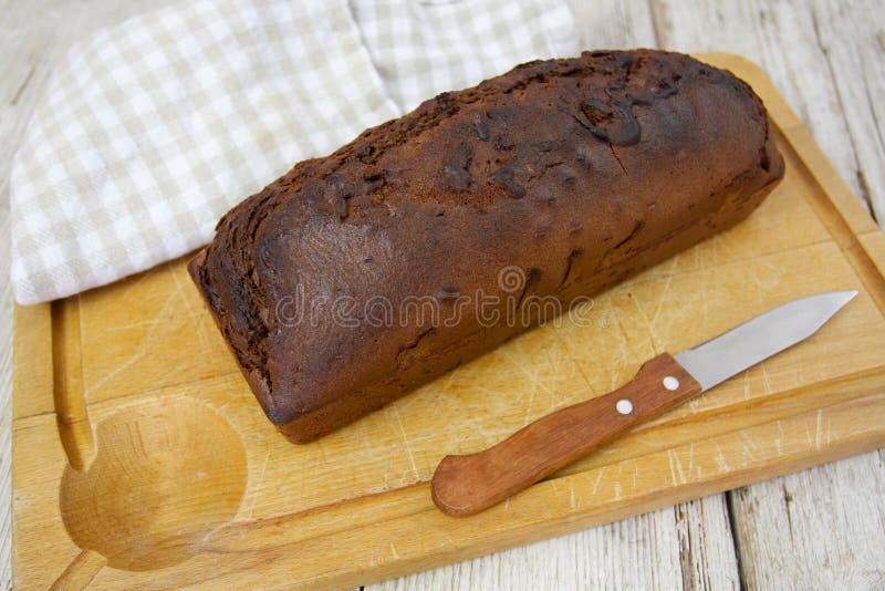 Dark chocolate cake stock image. Image of sponge, wooden - 124325203