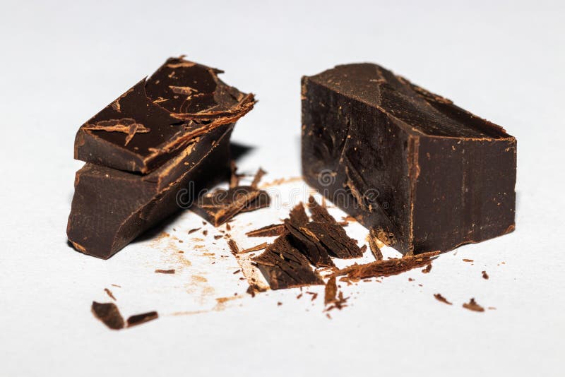 Dark Chocolate Split in Half with Little Pieces Isolated on White ...