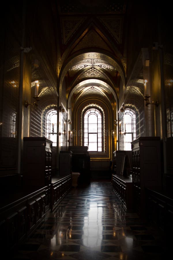 A dark church interior stock image. Image of church - 251667519
