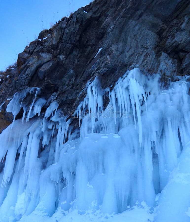 Dark cliffs in ice stock photo. Image of fell, cold - 174149270