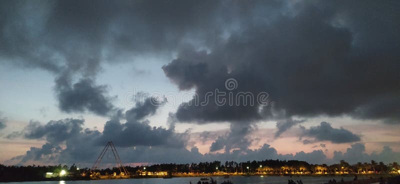 Dark Cloud in the Night Sky in Front of Lake Stock Image - Image of ...