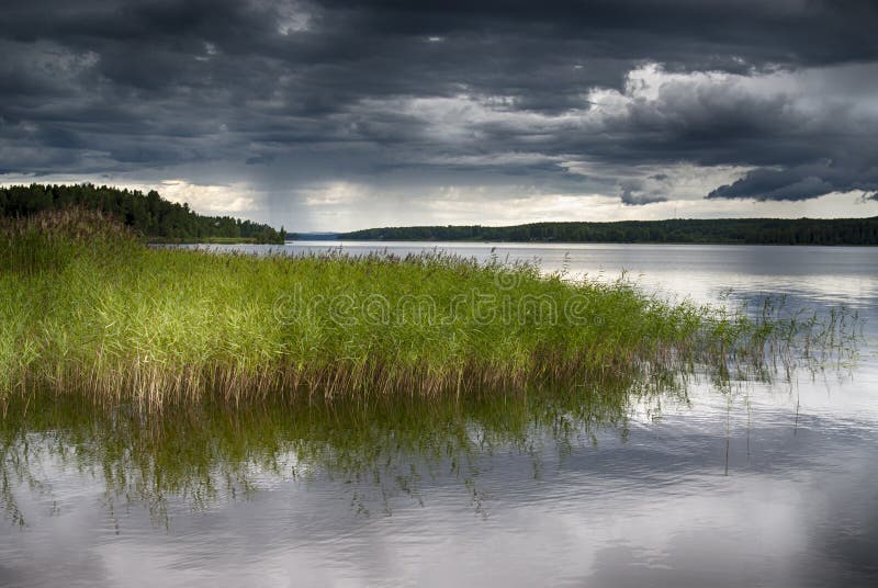 Dramatic sky over lake stock photo. Image of awesome - 30118488