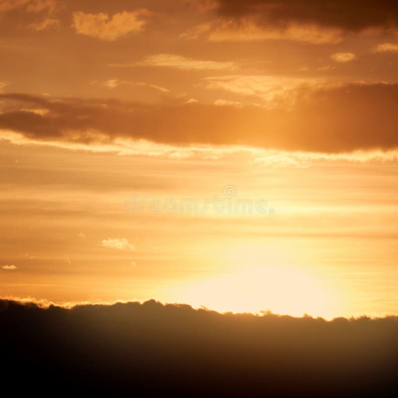 Dark Clouds in the Evening Sunset Sky with the Setting Sun. Dramatic Sk ...