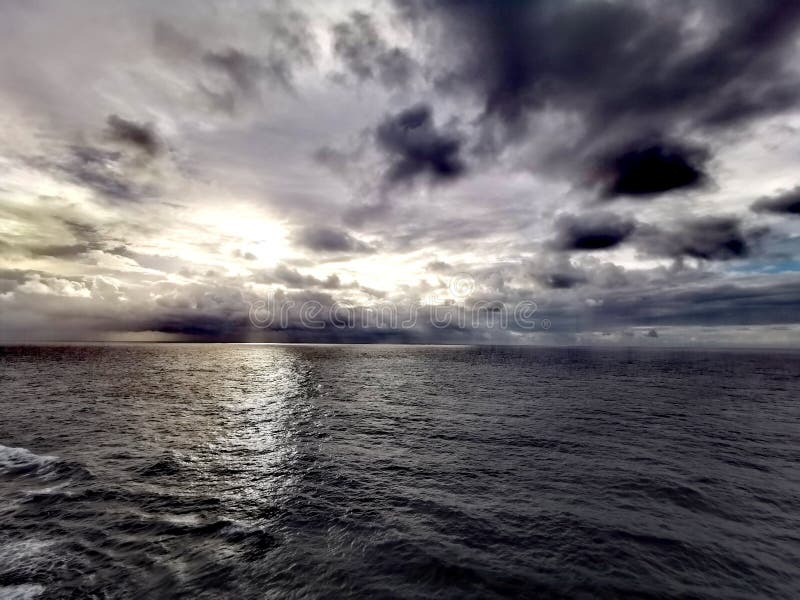 Dark clouds and Ocean view stock image. Image of view - 170905295