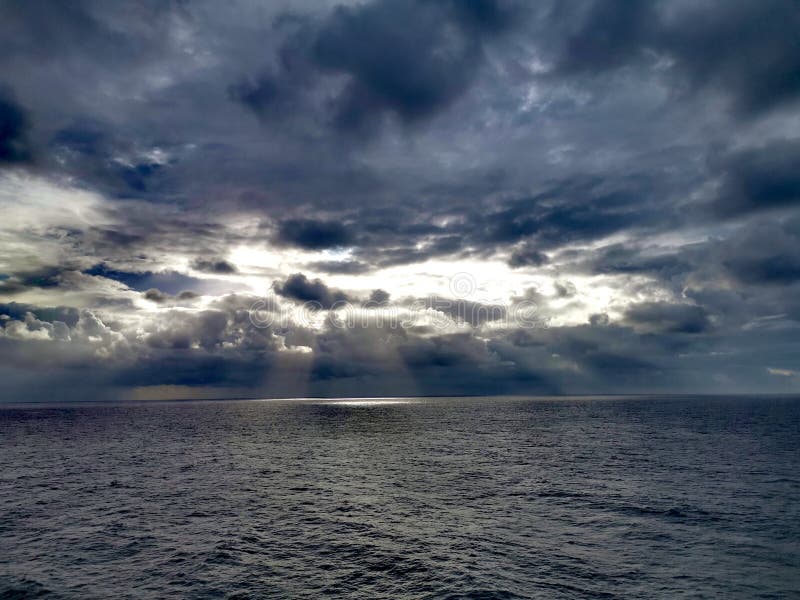 Dark clouds and Ocean view stock image. Image of ocean - 170905689