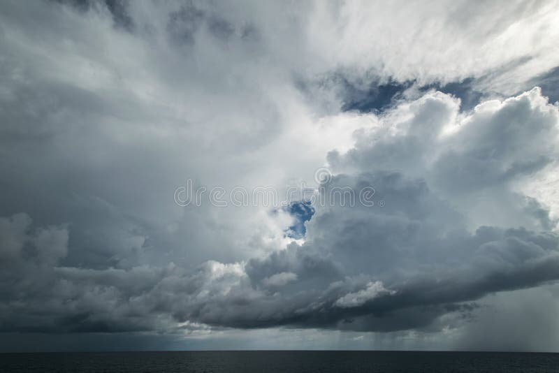 Dark clouds in open ocean stock photo. Image of caribbean - 94260448