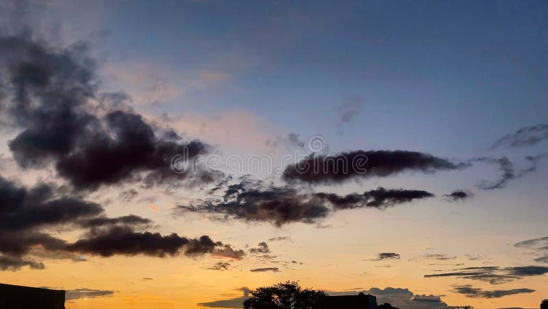 Dark Clouds on a Sunset Golden View Stock Photo - Image of sunset ...