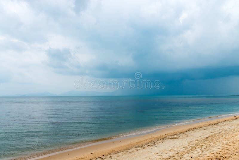 Dark Clouds and Tropical Rain Over the Sea Stock Photo - Image of calm ...