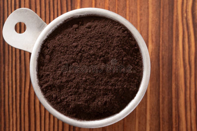 Dark Cocoa Powder in a Vintage Measuring Cup Stock Photo - Image of ...