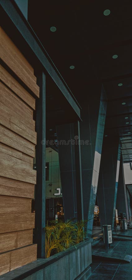 Dark corner of the mall stock photo. Image of building - 218858860