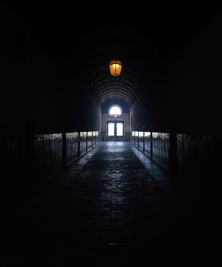 Dark Corridor Towards the Light Stock Photo - Image of dark, wood ...