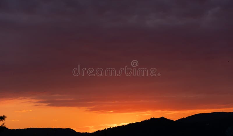 Dark Crimson Dusk Cloudy Sky. Cloudscape with Copy Space Stock Image ...