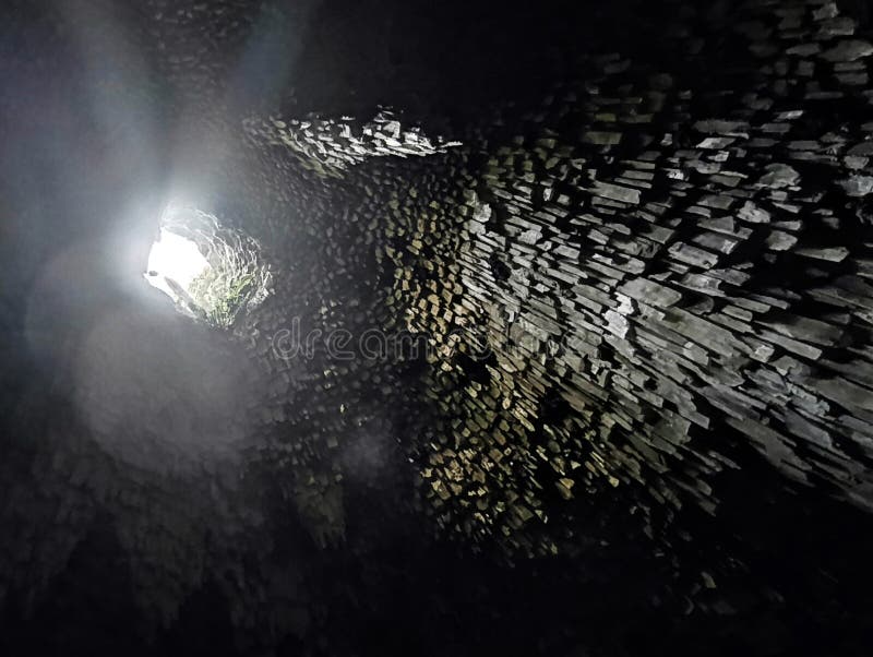 Cave with Light and Stalagmite Stock Image - Image of entrance ...