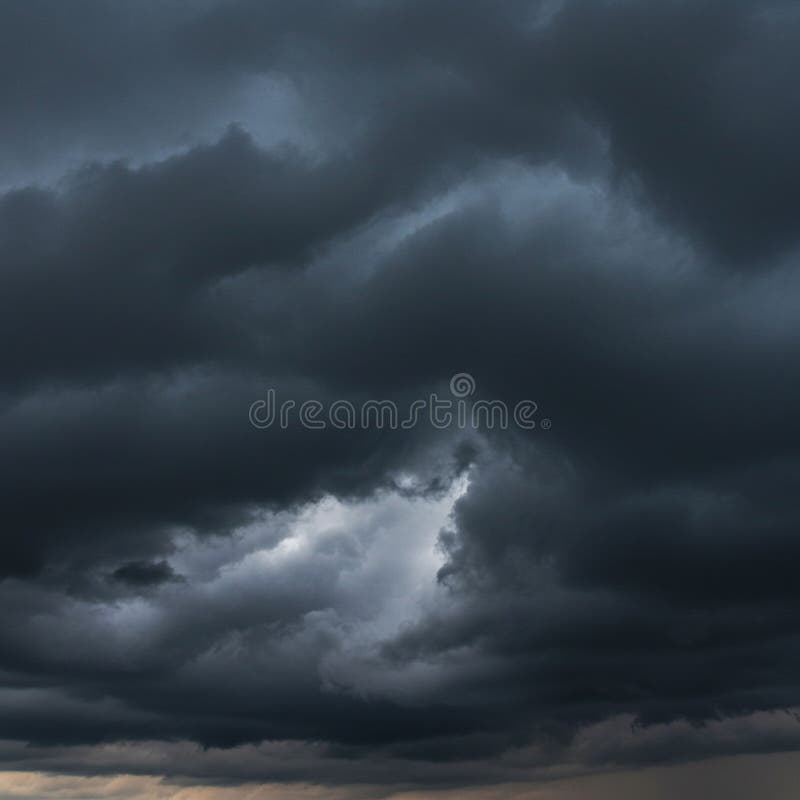 Dark, Dense Storm Clouds Fill the Sky, Creating a Dramatic Scene. a ...