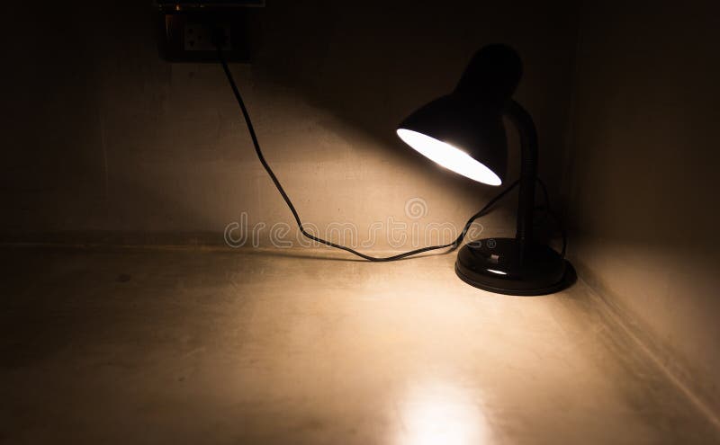 Dark Desk Corner with Light from Lamp Stock Image - Image of black ...