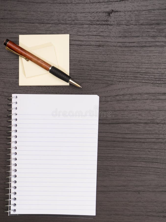 Dark Desk, Spiral Notebook, Sticky Notes, Pen Stock Photo - Image of ...