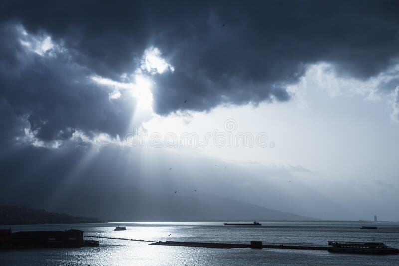 Dark Dramatic Sky with Sunlight Rays Over Sea Stock Image - Image of ...