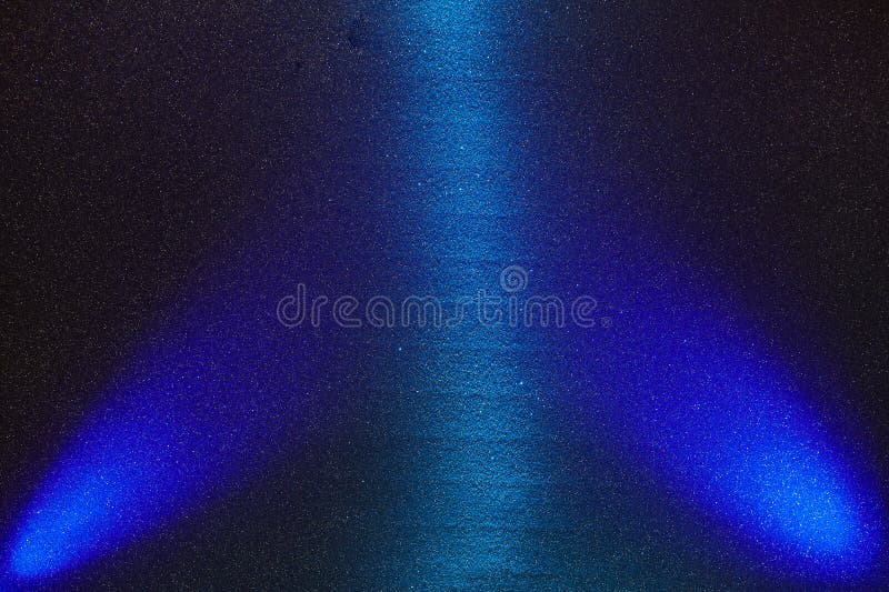 On a Dark Finely Grained Background, the Central Light Blue and Side ...