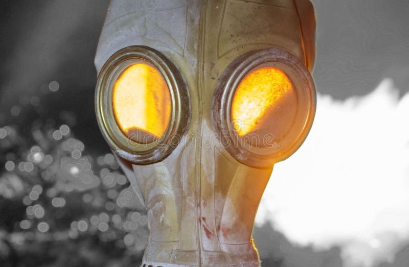 Dark Gas Mask on a Blurred Background of Fire and Ash in Fires in ...