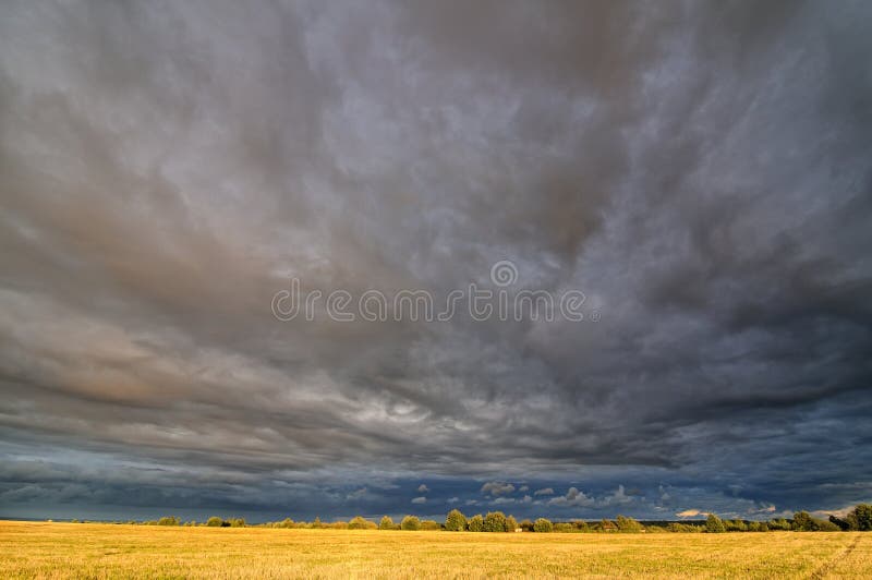 Clouds over the field. stock photo. Image of nature - 123911604