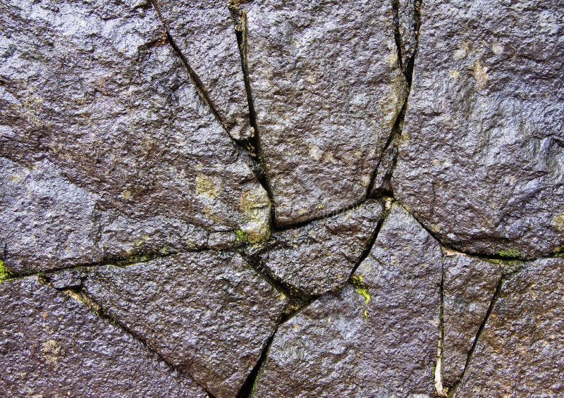Dark granite rock wall stock image. Image of rough, shiny - 13640925