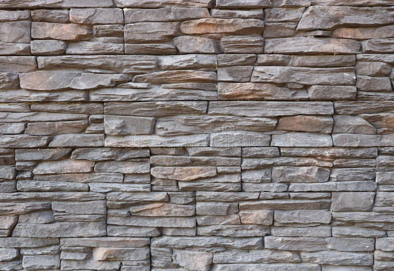 Stone Cladding Wall Made of Striped Stacked Slabs of Natural Rocks ...