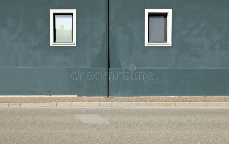 Dark Gray Plaster Wall with Gutter in the Middle and Two Windows by ...