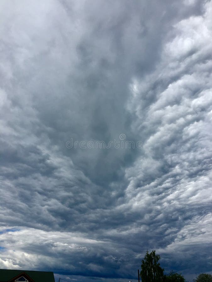 Dark Gray Storm Clouds in the City before the Heavy Rain Stock Image ...